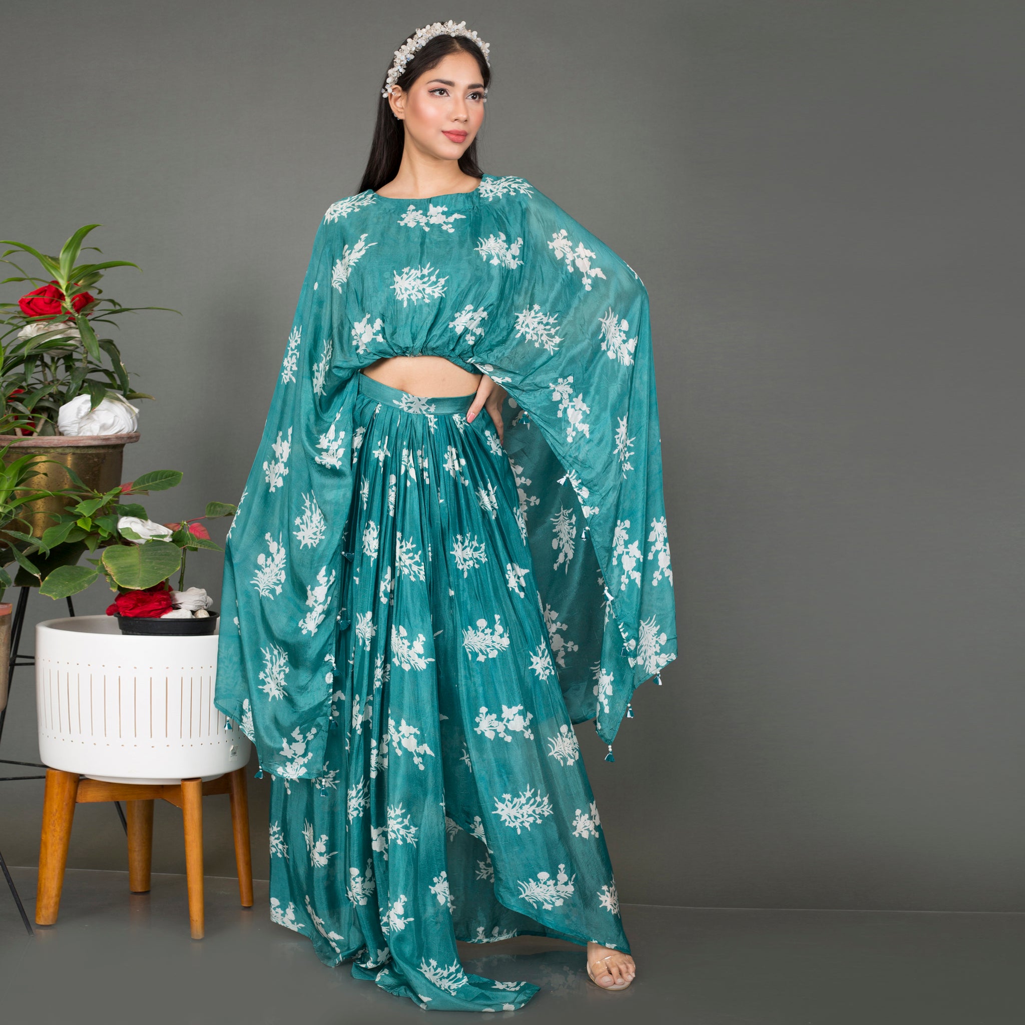 Cape style top with draped skirt